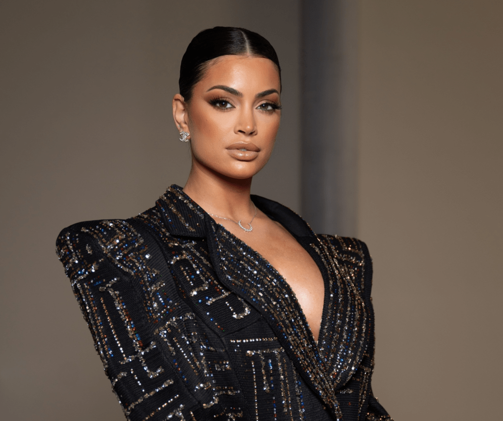 French reality star Melanie Da Cruz won at Paris Fashion Week wearing a creation by ELENA LUKA ...